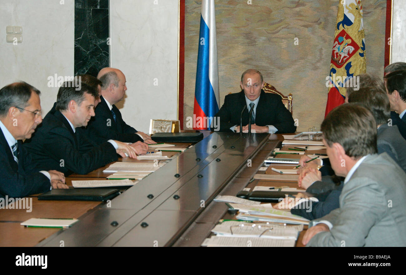 Russia s President Vladimir Putin center in conference with federal ...
