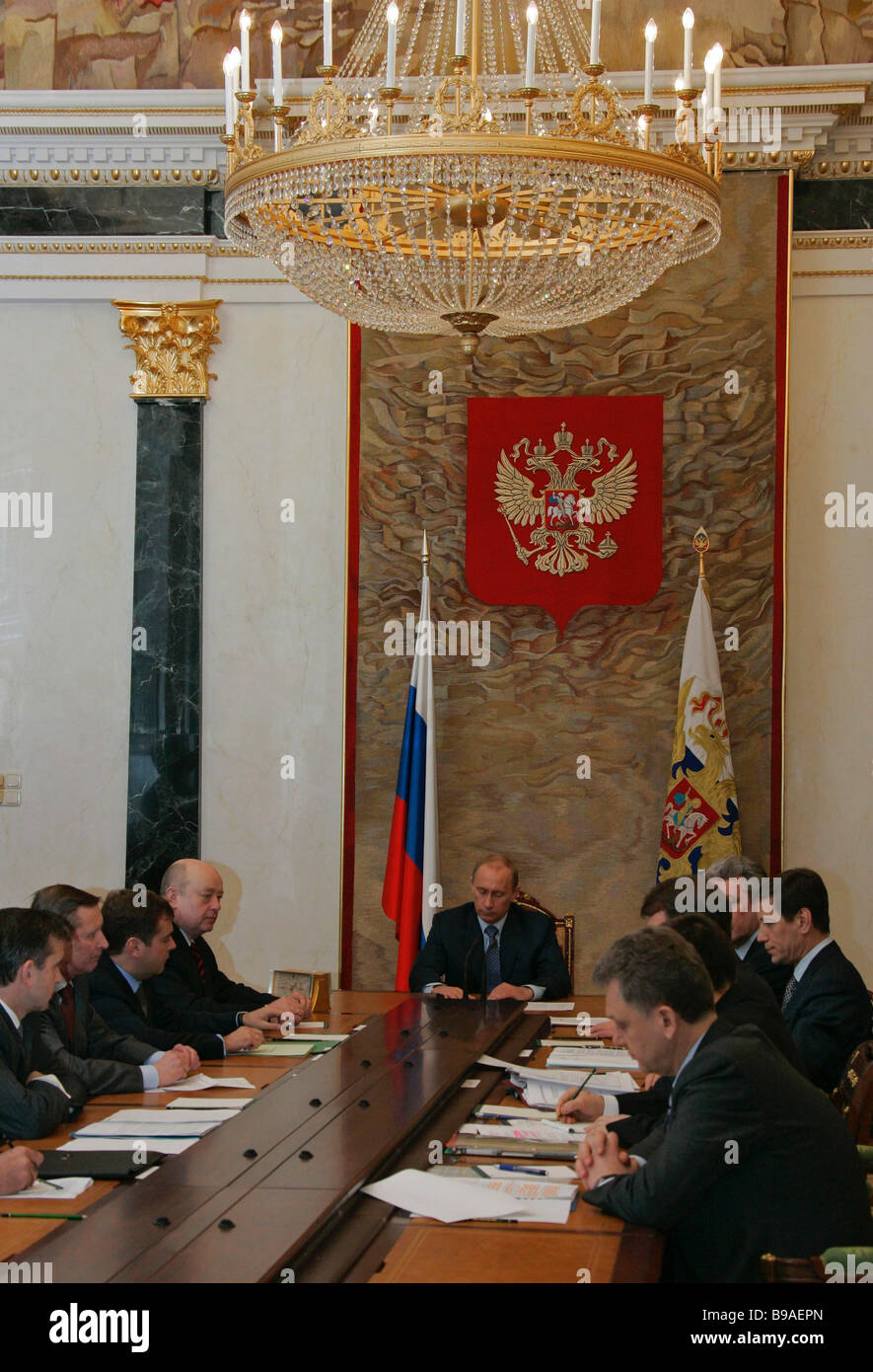 Russian President Vladimir Putin center holding a Kremlin session with ...