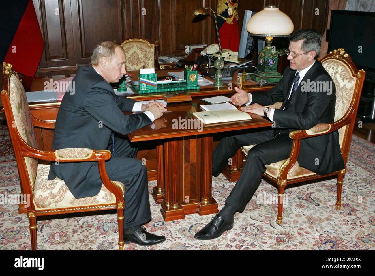 Russia s President Vladimir Putin left in routine Kremlin conference ...