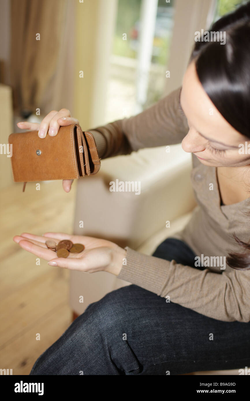 Young Woman Looking For Money Model Released Stock Photo - Alamy