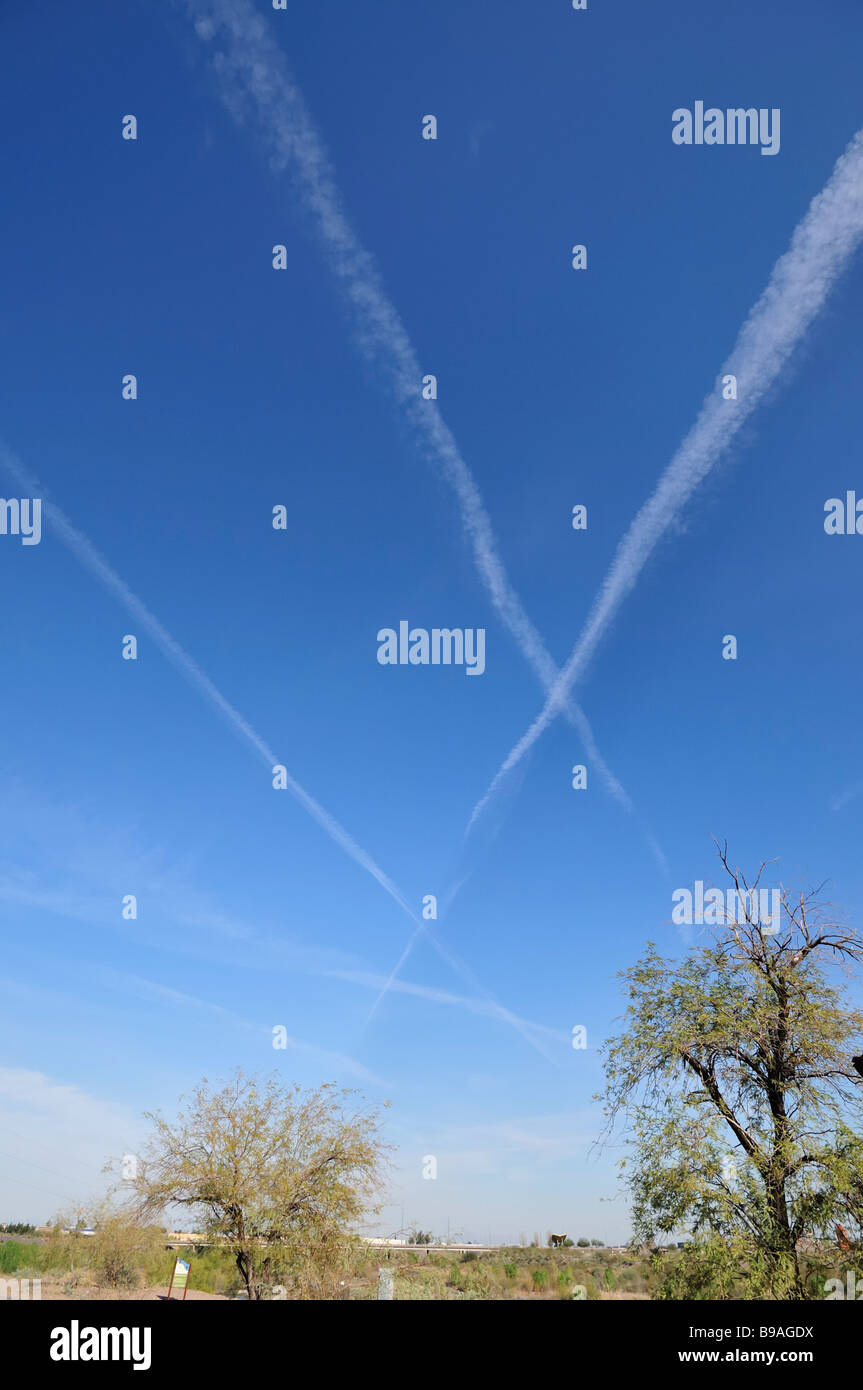 Crossing contrails make interesting patterns in the sky above Phoenix ...