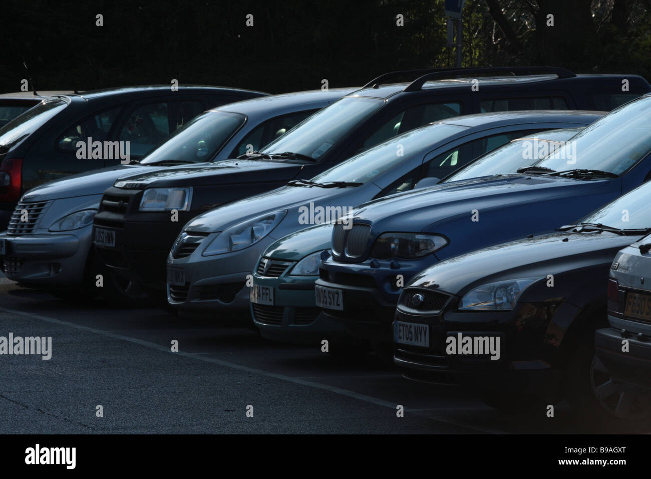 line up of parked cars Stock Photo - Alamy