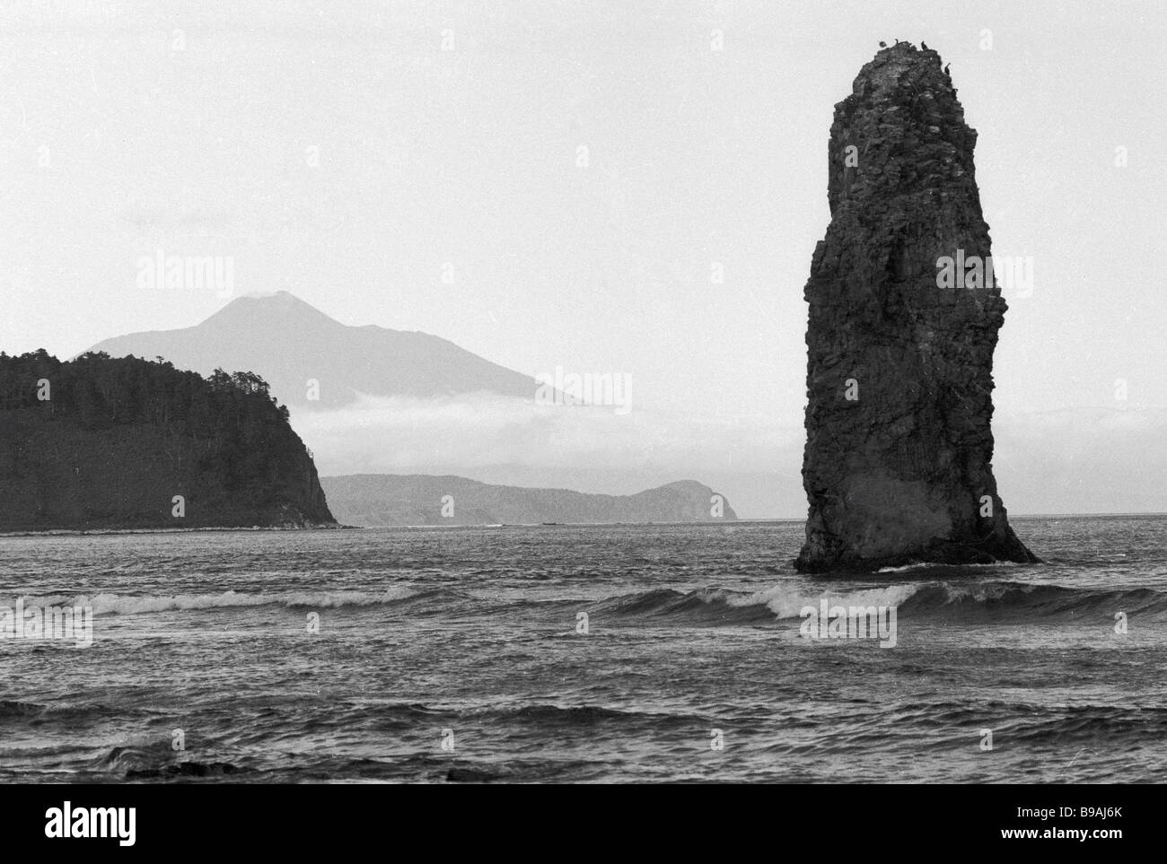 The Tyatya volcano left and the Devil s Finger rock formation on the ...
