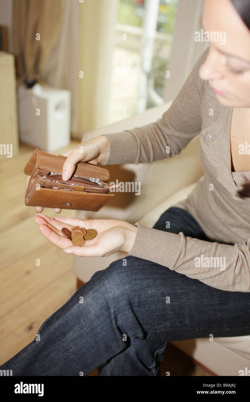Young Woman Looking For Money Model Released Stock Photo - Alamy