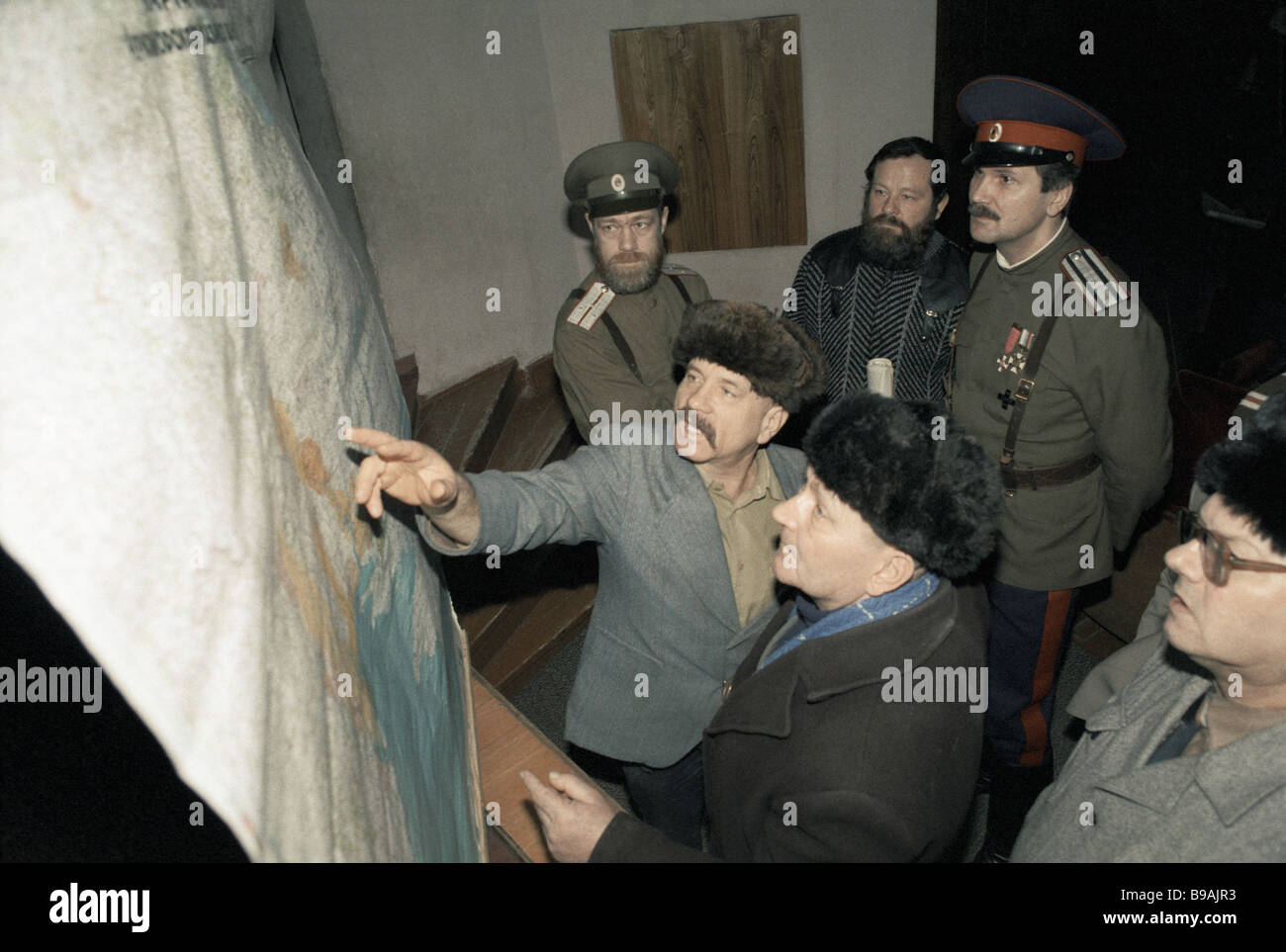 Tiraspol Cossacks examining old map designating the sites of Black Sea ...
