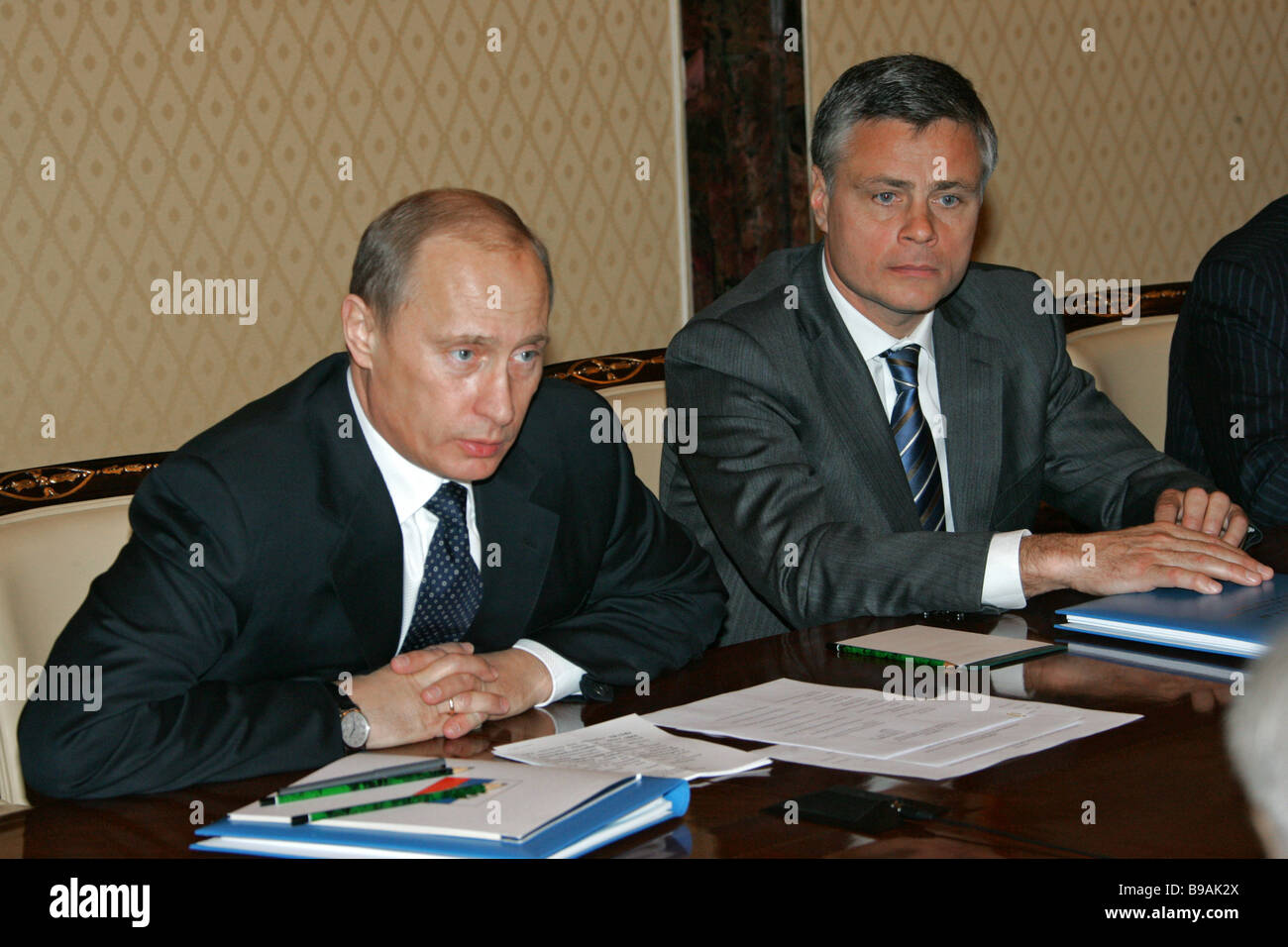 Russian President Vladimir Putin and his aide Alexander Abramov from ...