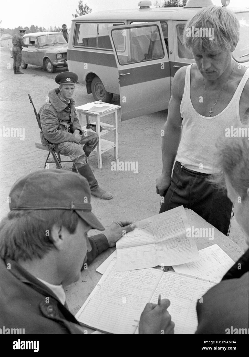 Checking identity of a driver Stock Photo - Alamy