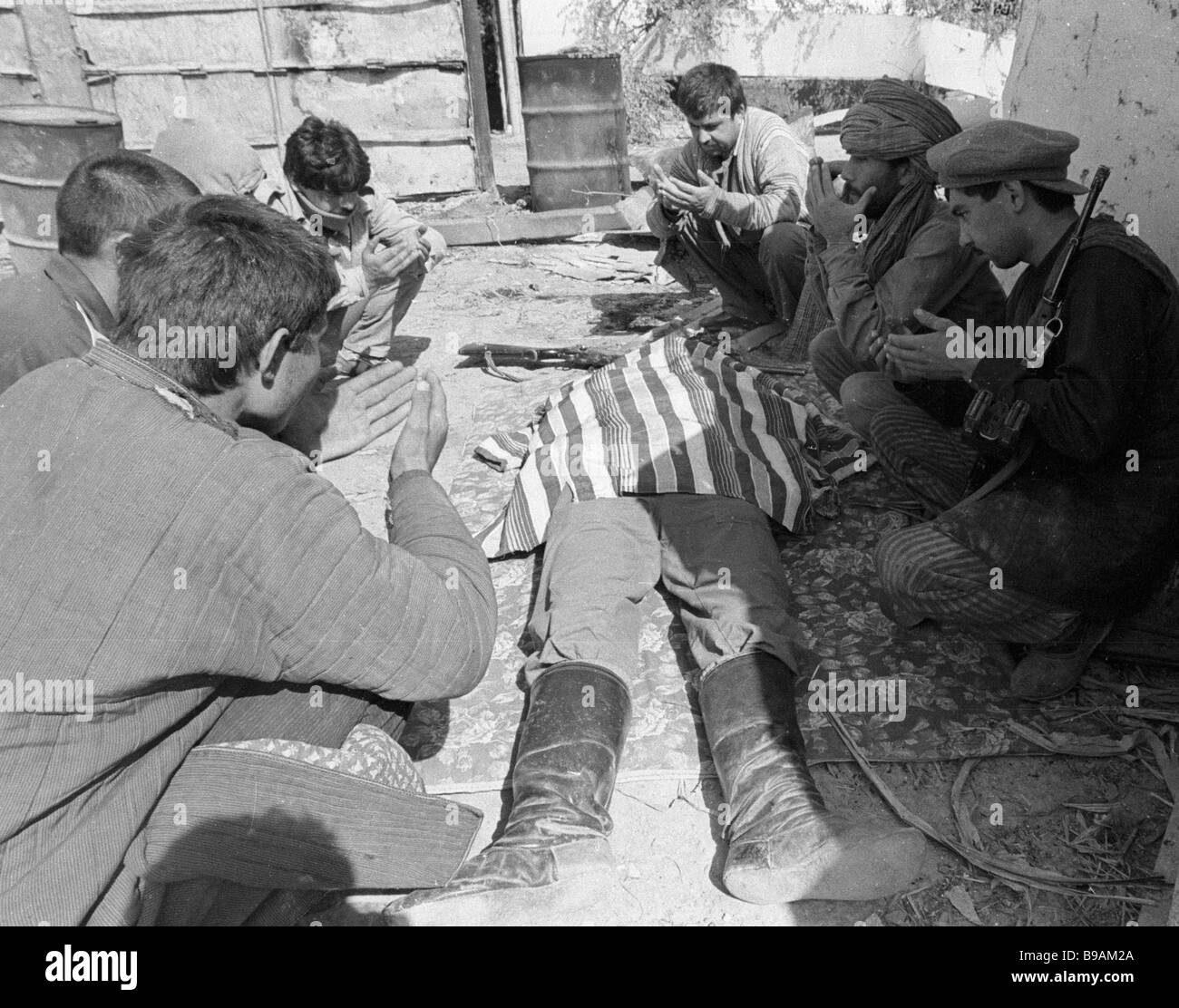 Presidential Guards mourning a comrade s death in a Kurgan Tyube ...