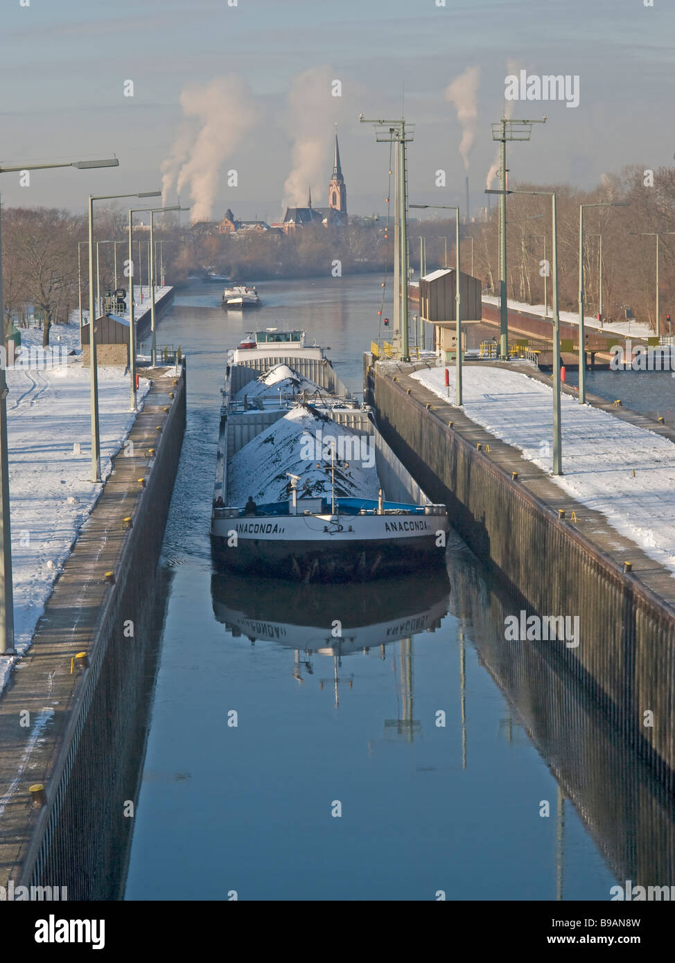 transport a barge with snow on the river Main at barrage in sluice by ...