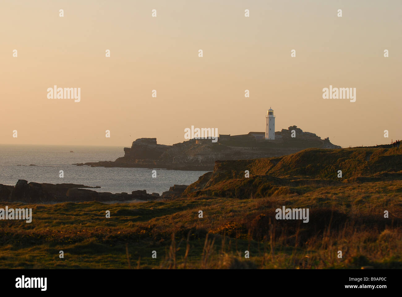 Godrevy lighthouse, looking back from the path, Cornwall, England Stock ...