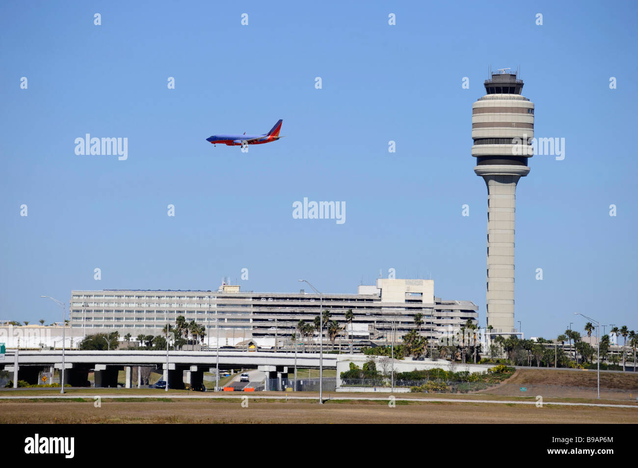 Airplane Jet prepares to land Control Tower at Orlando International ...