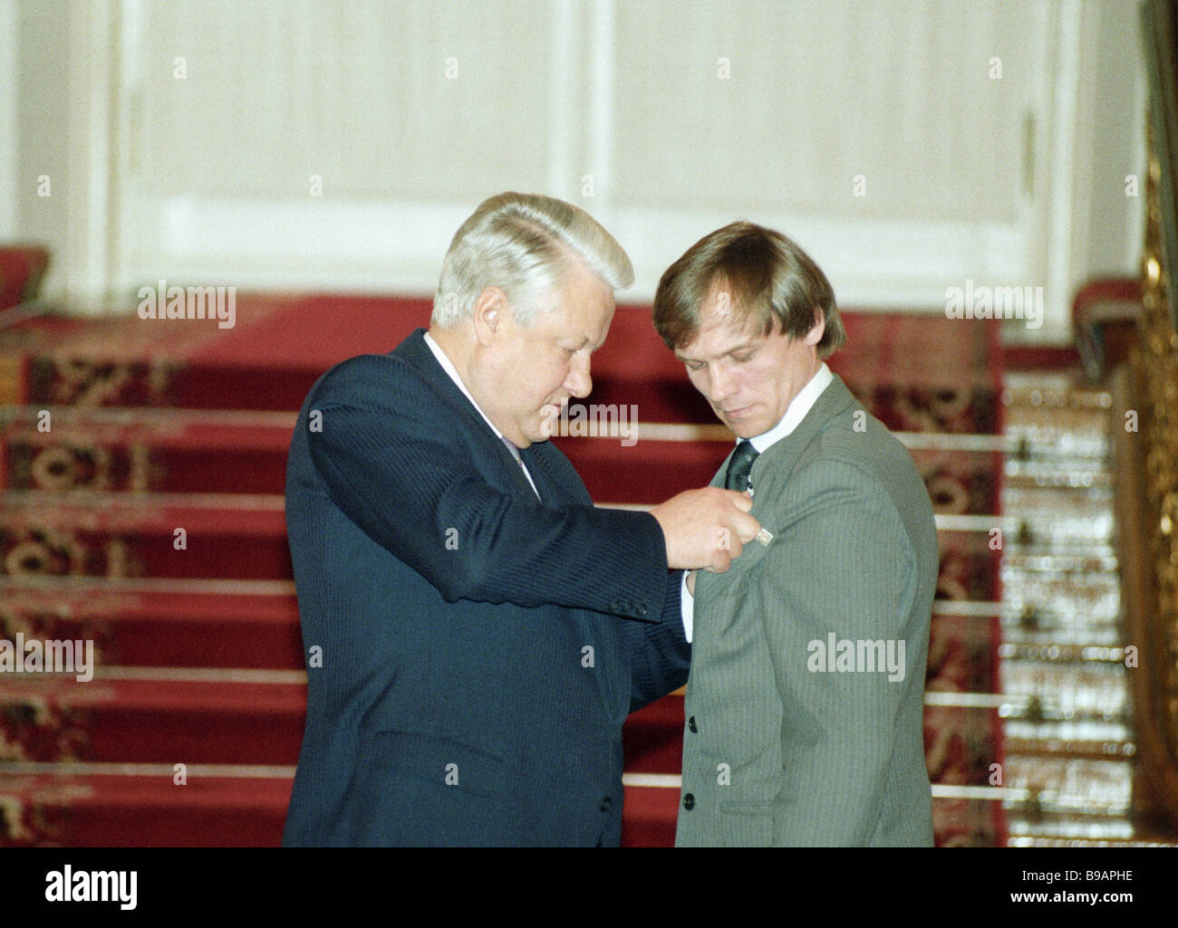 Russian President Boris Yeltsin left presenting Pilot Cosmonaut Sergei ...