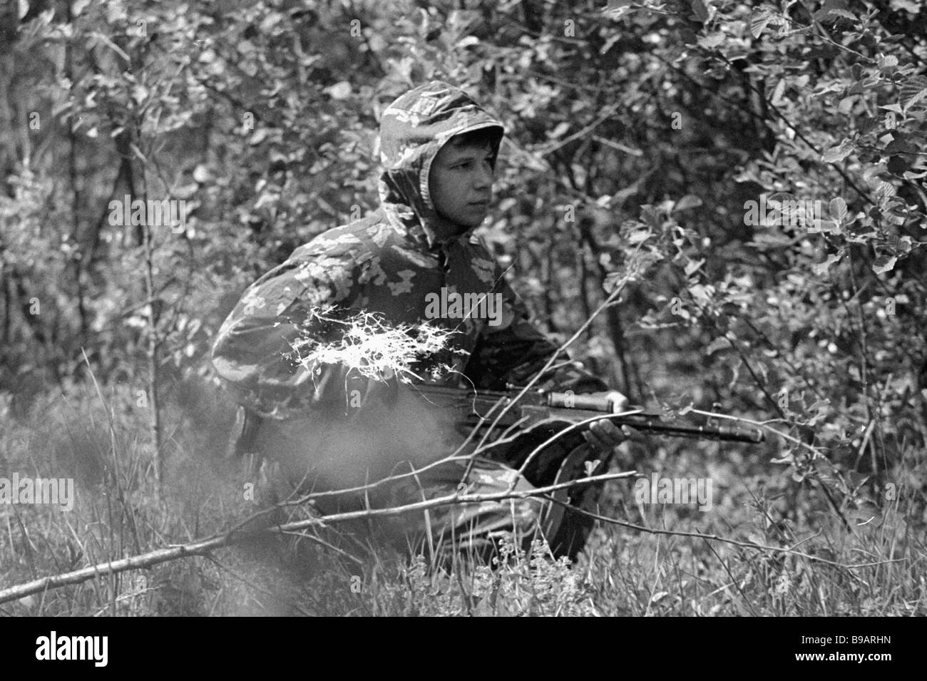 A frontier guard at a listening post on the Russian Lithuanian border ...
