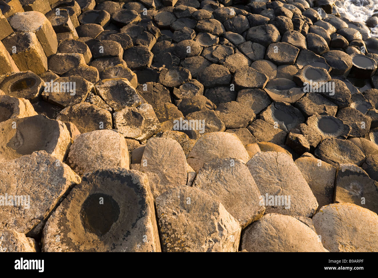 Hexagonal Pattern. The basalt columns of the causeway step down toward ...
