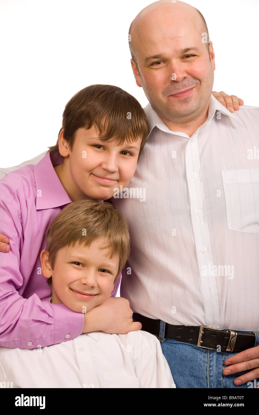 father with two sons on a white background Stock Photo - Alamy