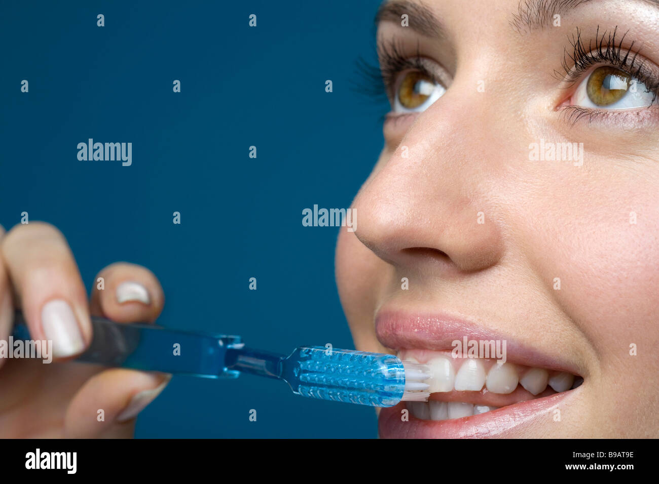 Close up of woman brushing teeth Stock Photo - Alamy