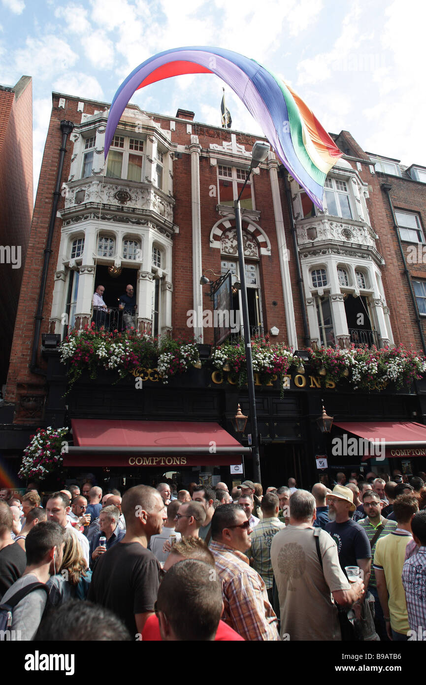 Crowed of people outside Comptons pub in Soho,London during the Gay ...