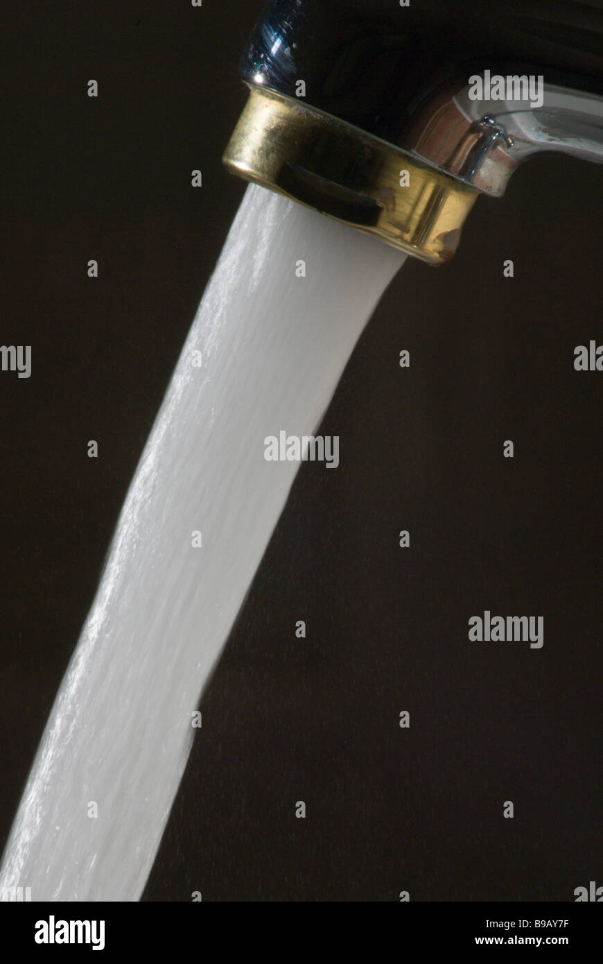 Water flowing from tap Stock Photo - Alamy