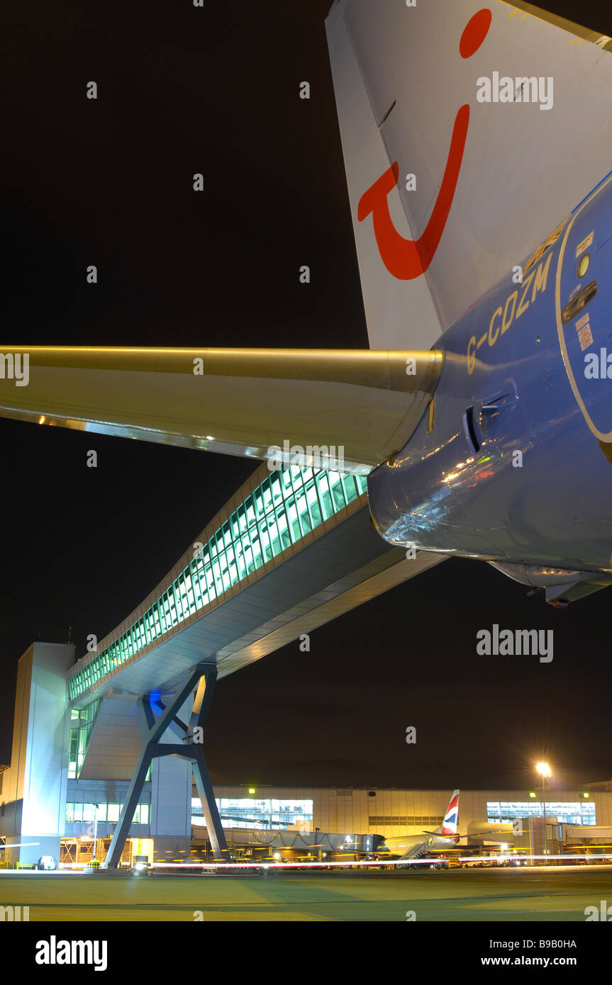 Aircraft and bridge at night Stock Photo - Alamy