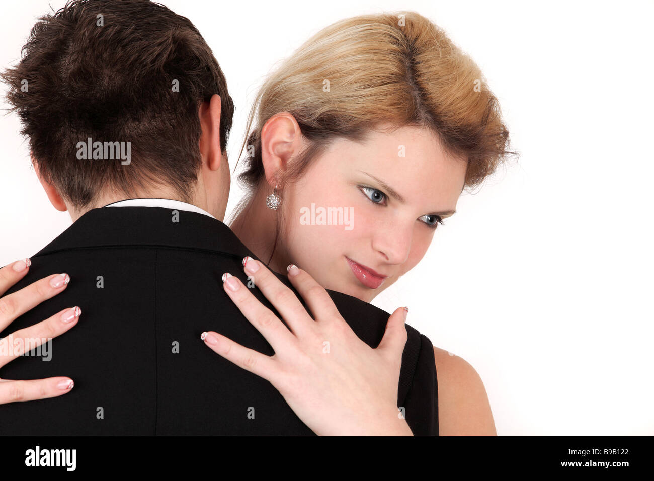 Well dressed couple dancing inside hi-res stock photography and images ...