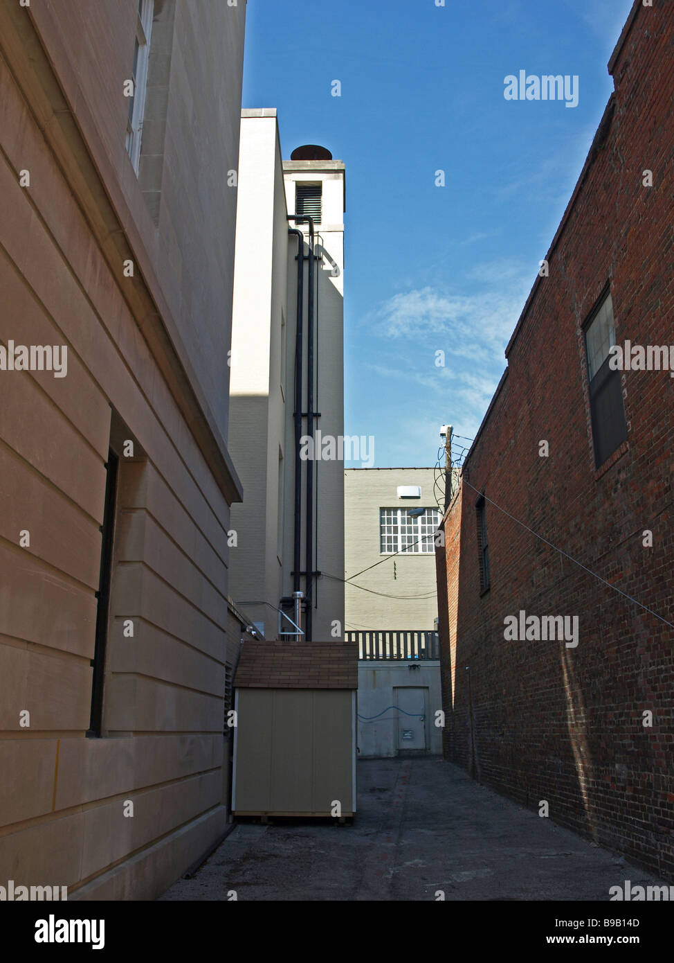alley with building at end materials include stone brick pavement blue ...