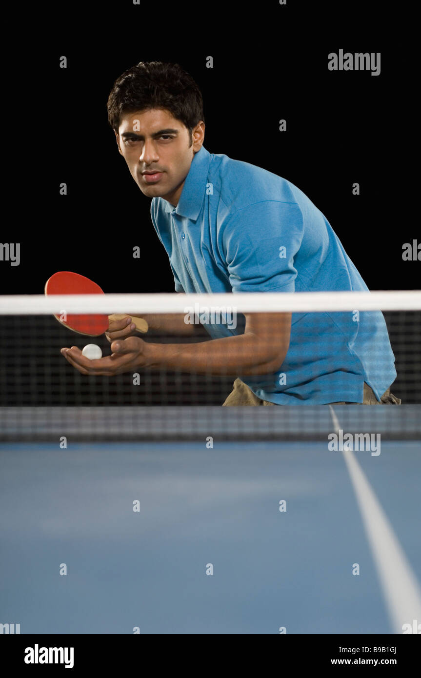 Man playing table tennis Stock Photo - Alamy