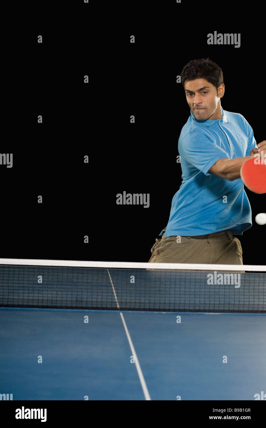 Man playing table tennis Stock Photo - Alamy