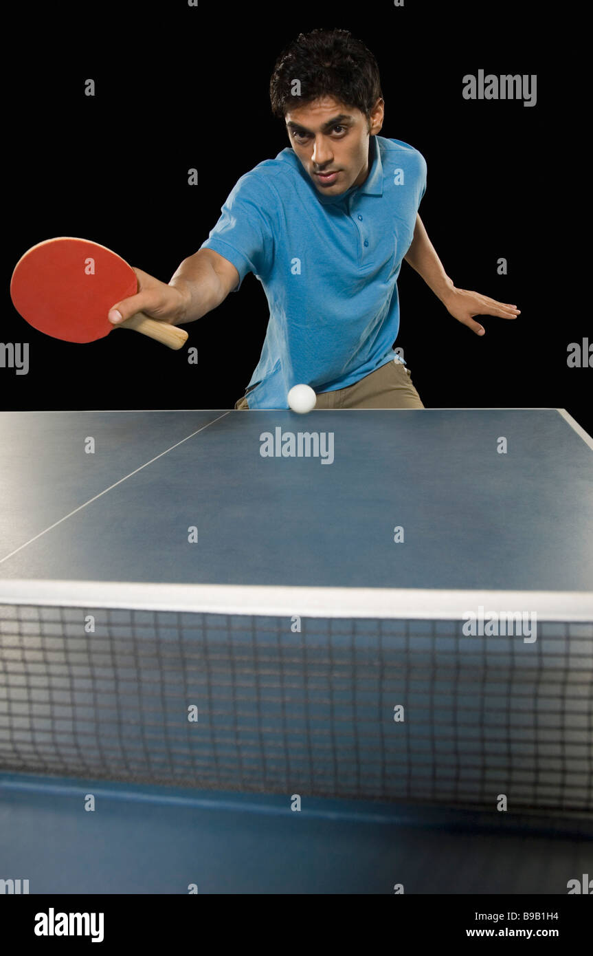Man playing table tennis Stock Photo - Alamy