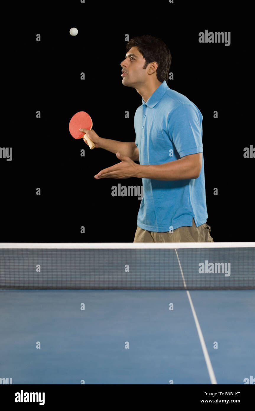 Man playing table tennis Stock Photo - Alamy