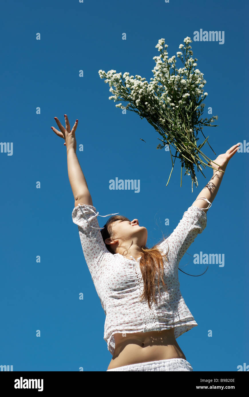 Throwing flowers up hi-res stock photography and images - Alamy