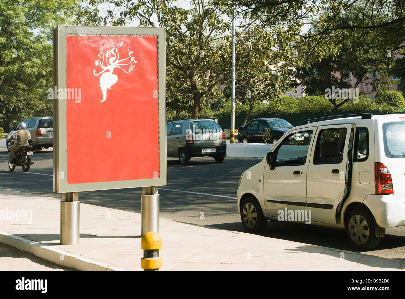 Board on a sidewalk, New Delhi, India Stock Photo - Alamy