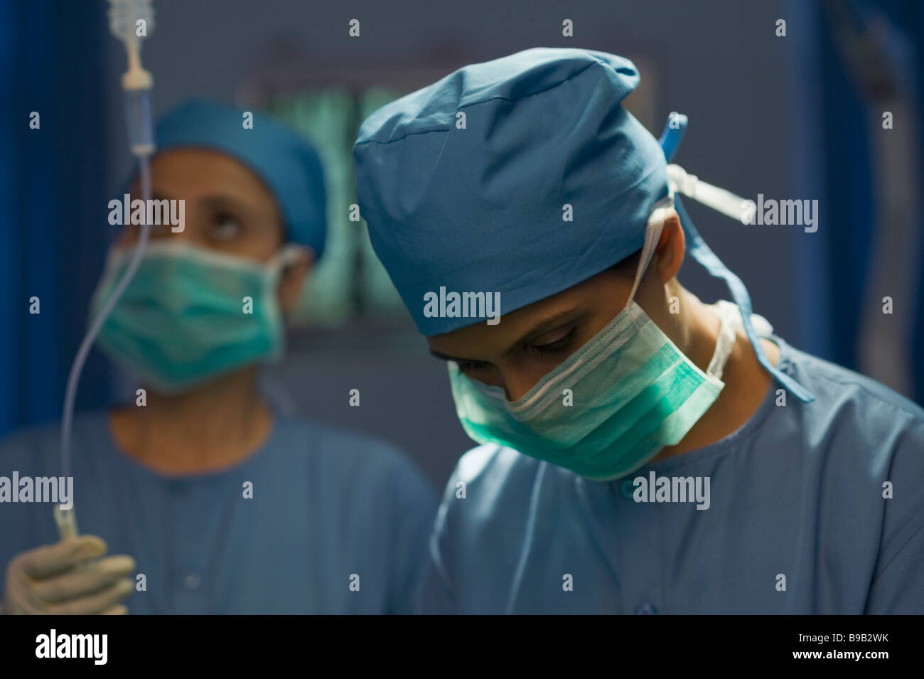 Two female surgeons in an operating room Stock Photo - Alamy
