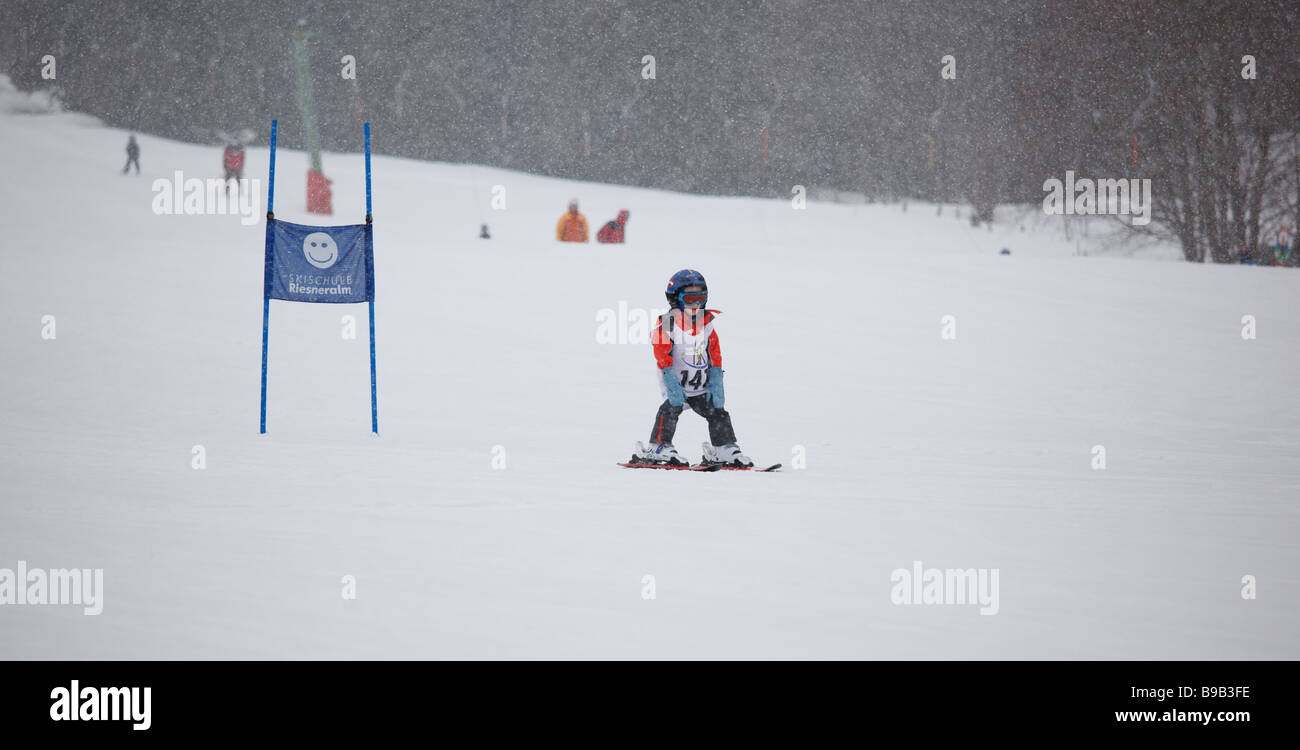 little boy at his first skiing race Stock Photo - Alamy