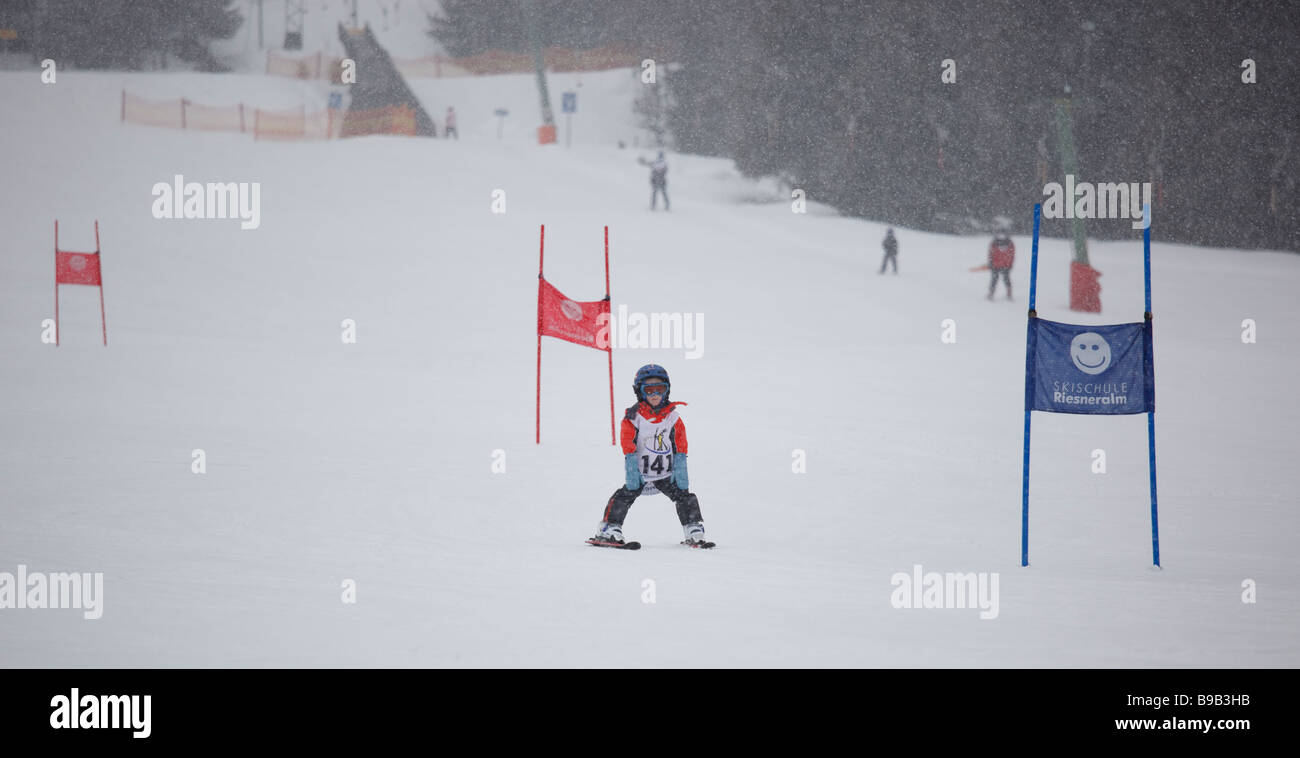 little boy at his first skiing race Stock Photo - Alamy