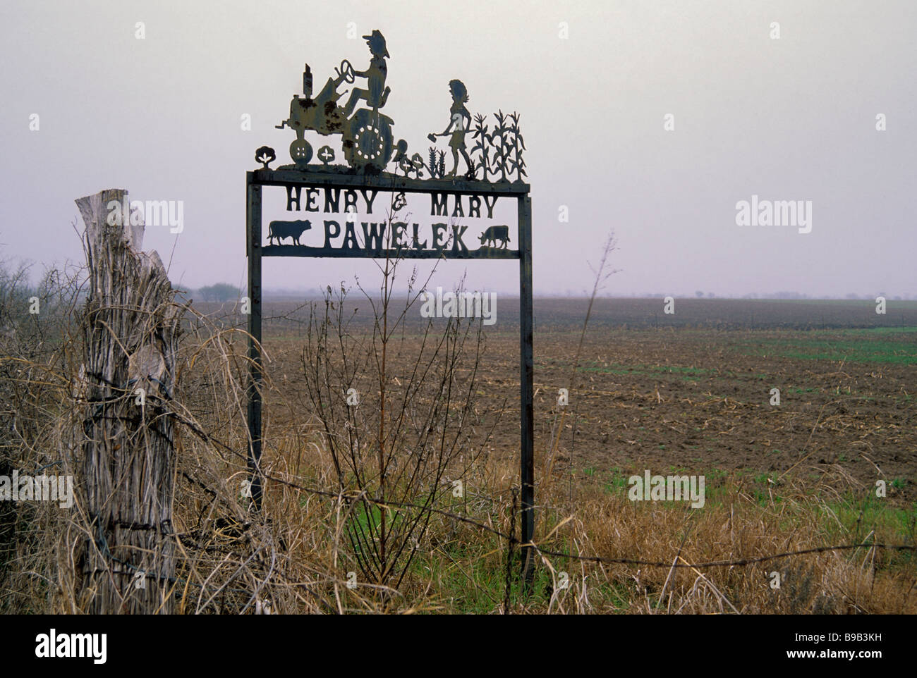Wrought iron sign at entrance to farm in Panna Maria, the oldest Polish ...