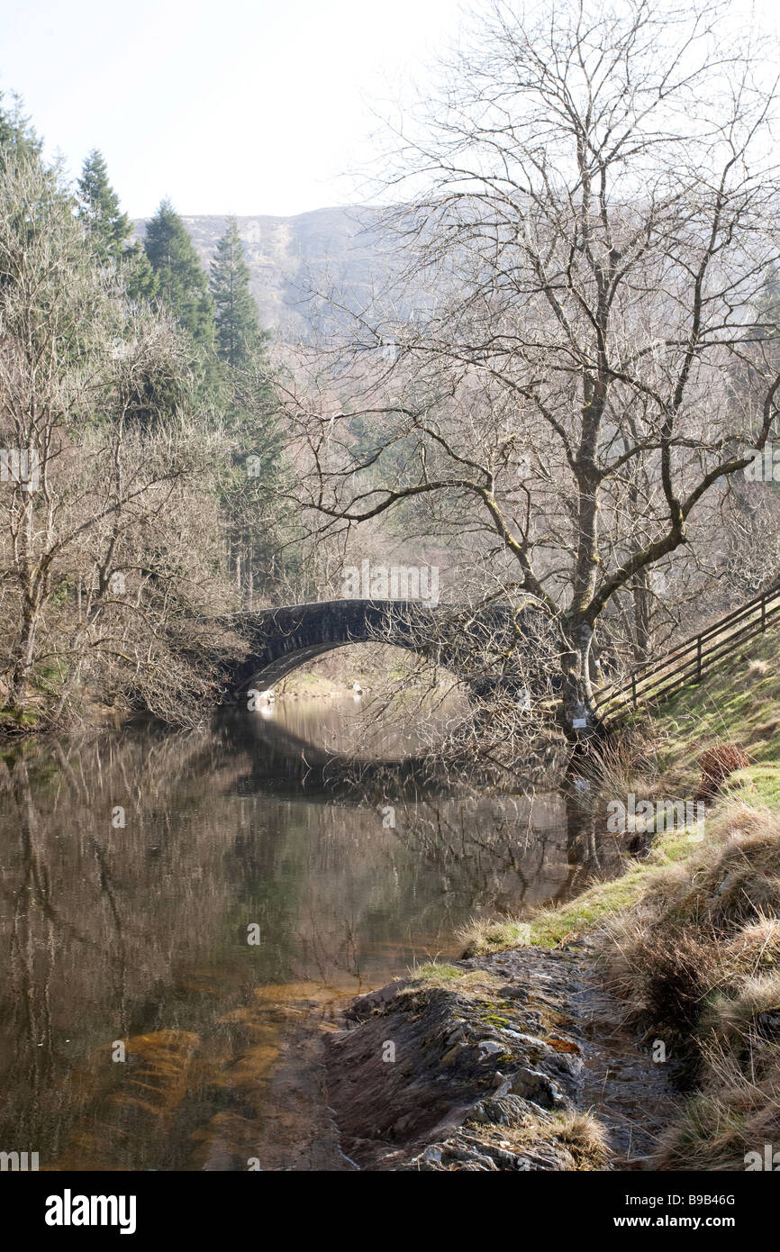 stone bridge over a calm river Stock Photo - Alamy