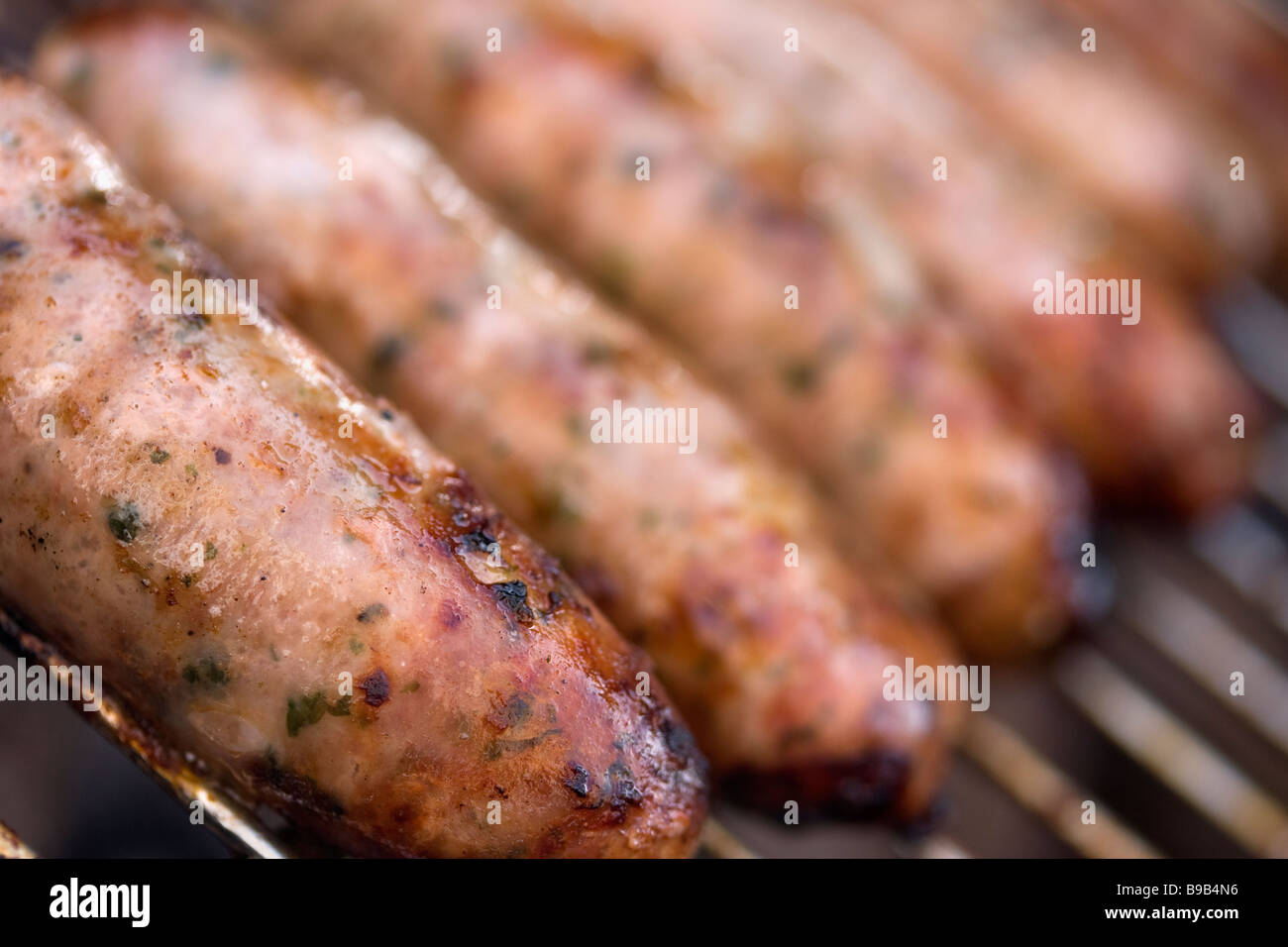 cooking sausages on barbecue Stock Photo - Alamy
