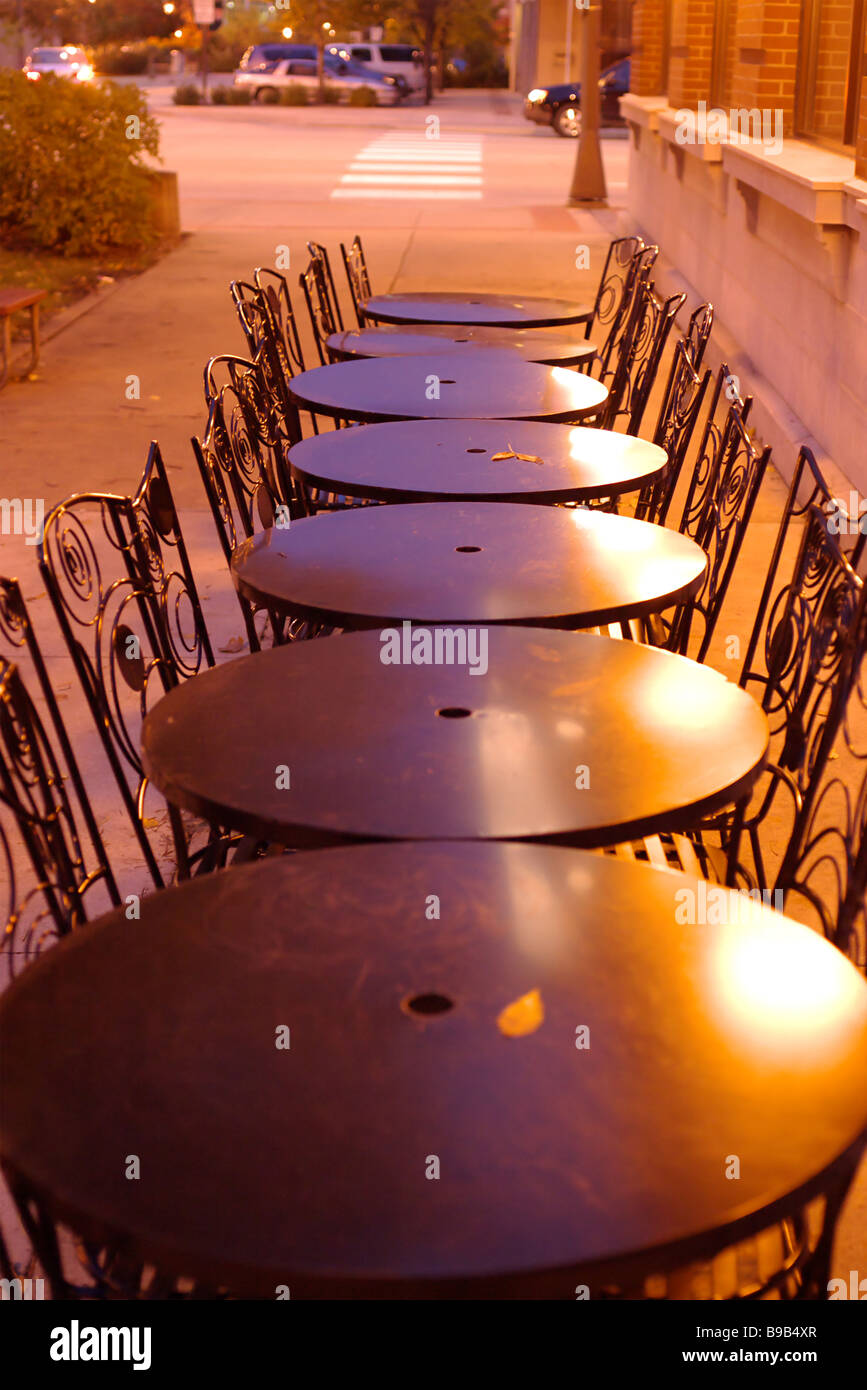 Empty tables at night Stock Photo - Alamy