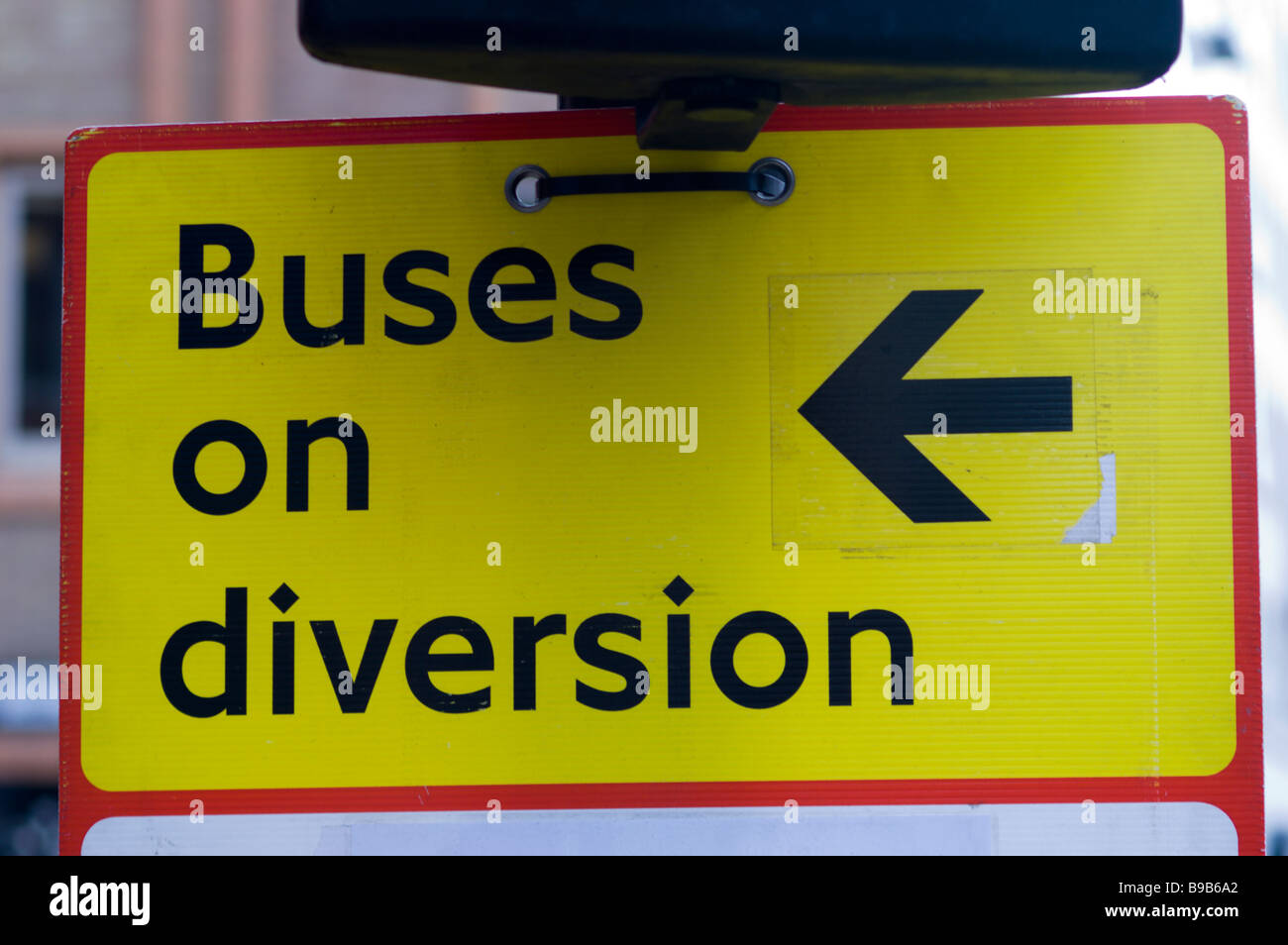 Buses on Diversion temporary road sign Stock Photo - Alamy