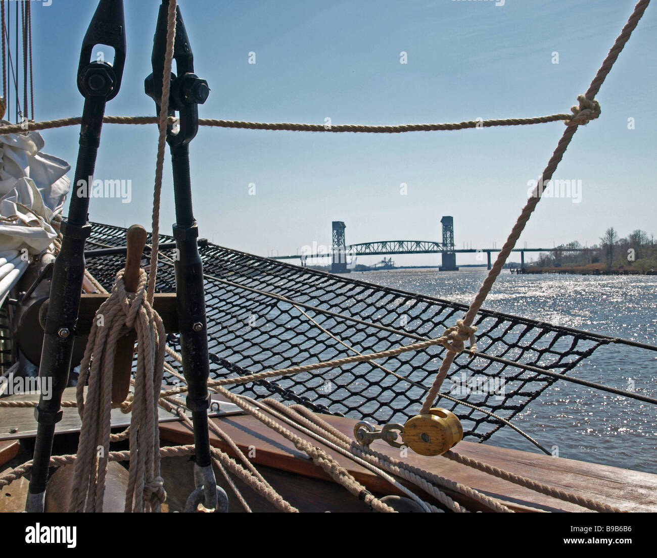 looking out from deck of tall-ship viewing bridge river netting roaps ...