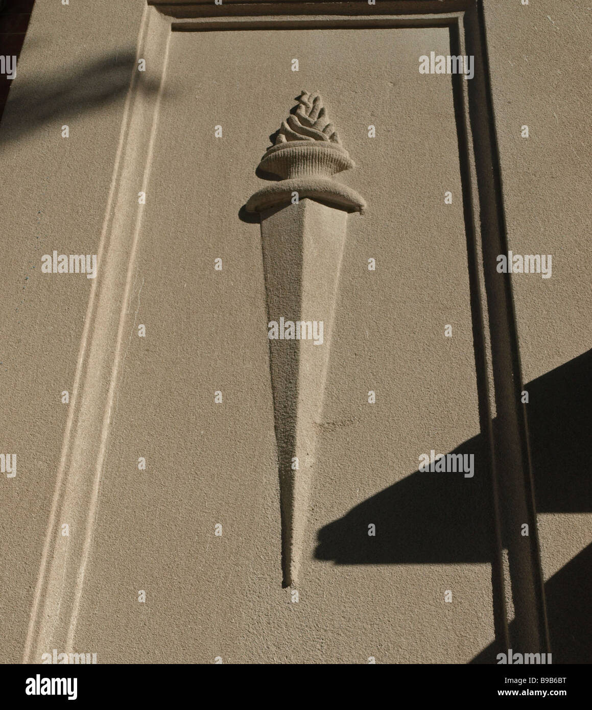 wall decoration outside stone wall torch sculpture with shadows Stock ...