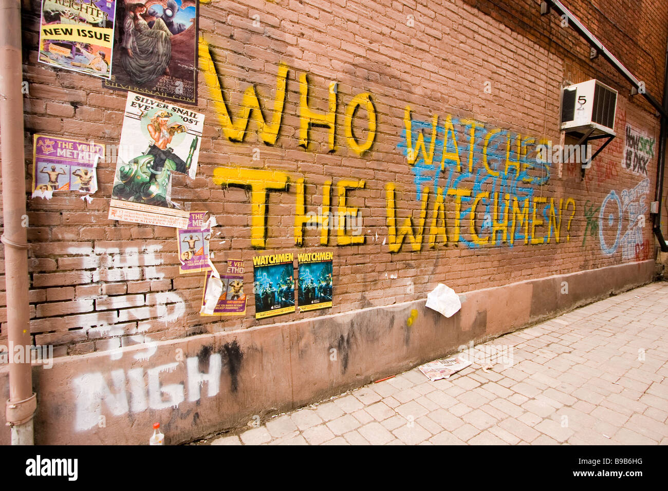 "Who watches the Watchmen?" graffiti in downtown Toronto Stock Photo ...