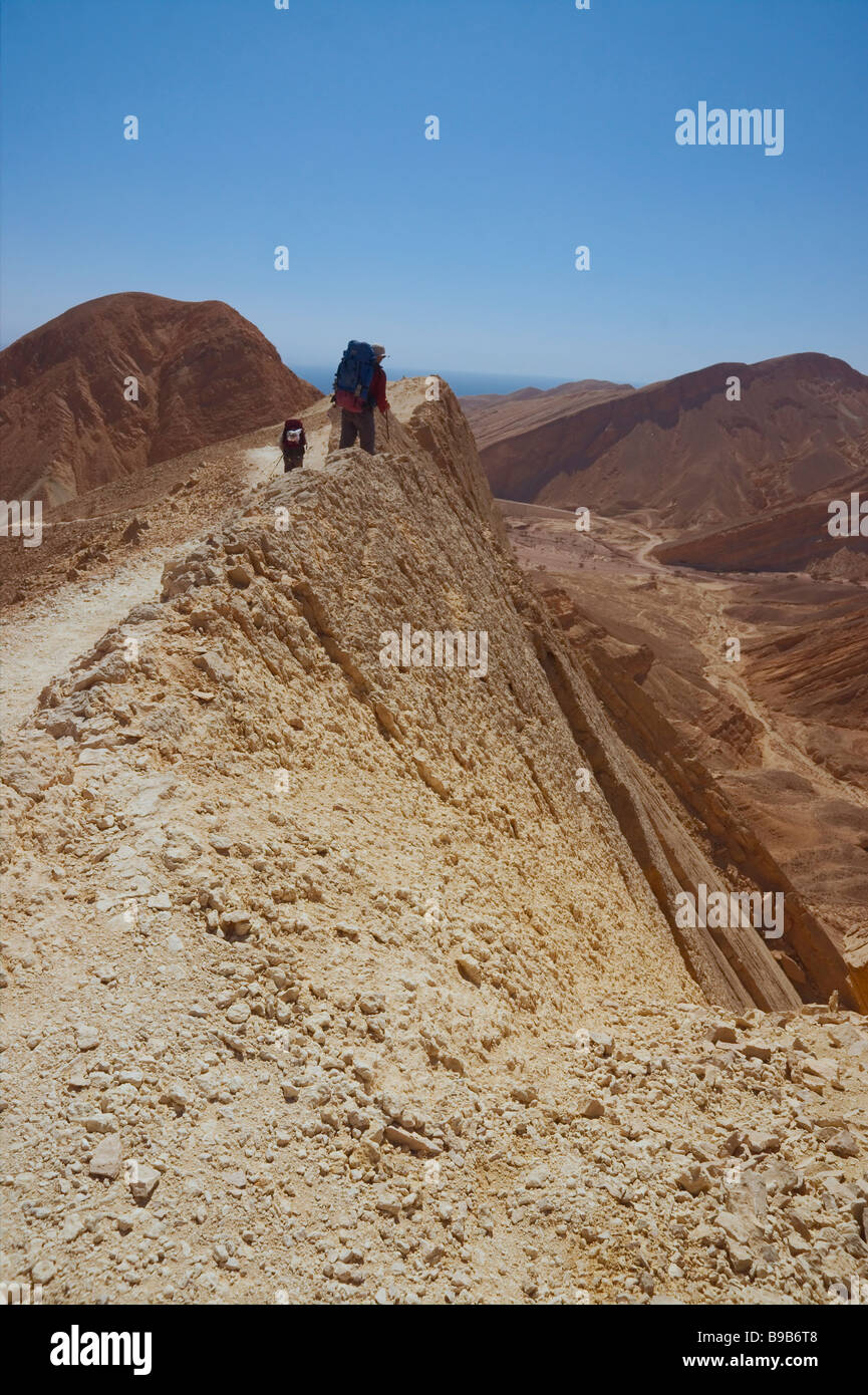 Eilat Mountains, Israel.Hikers on the Israel National Trail walk on the ...