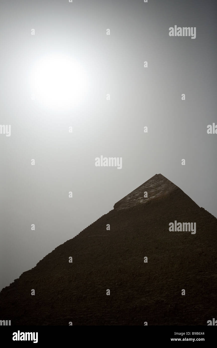 sun over giza pyramids Stock Photo - Alamy