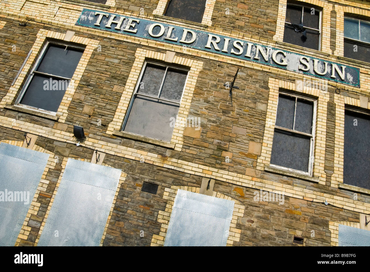 Boarded up pub THE OLD RISING SUN in Newport South Wales UK Stock Photo ...
