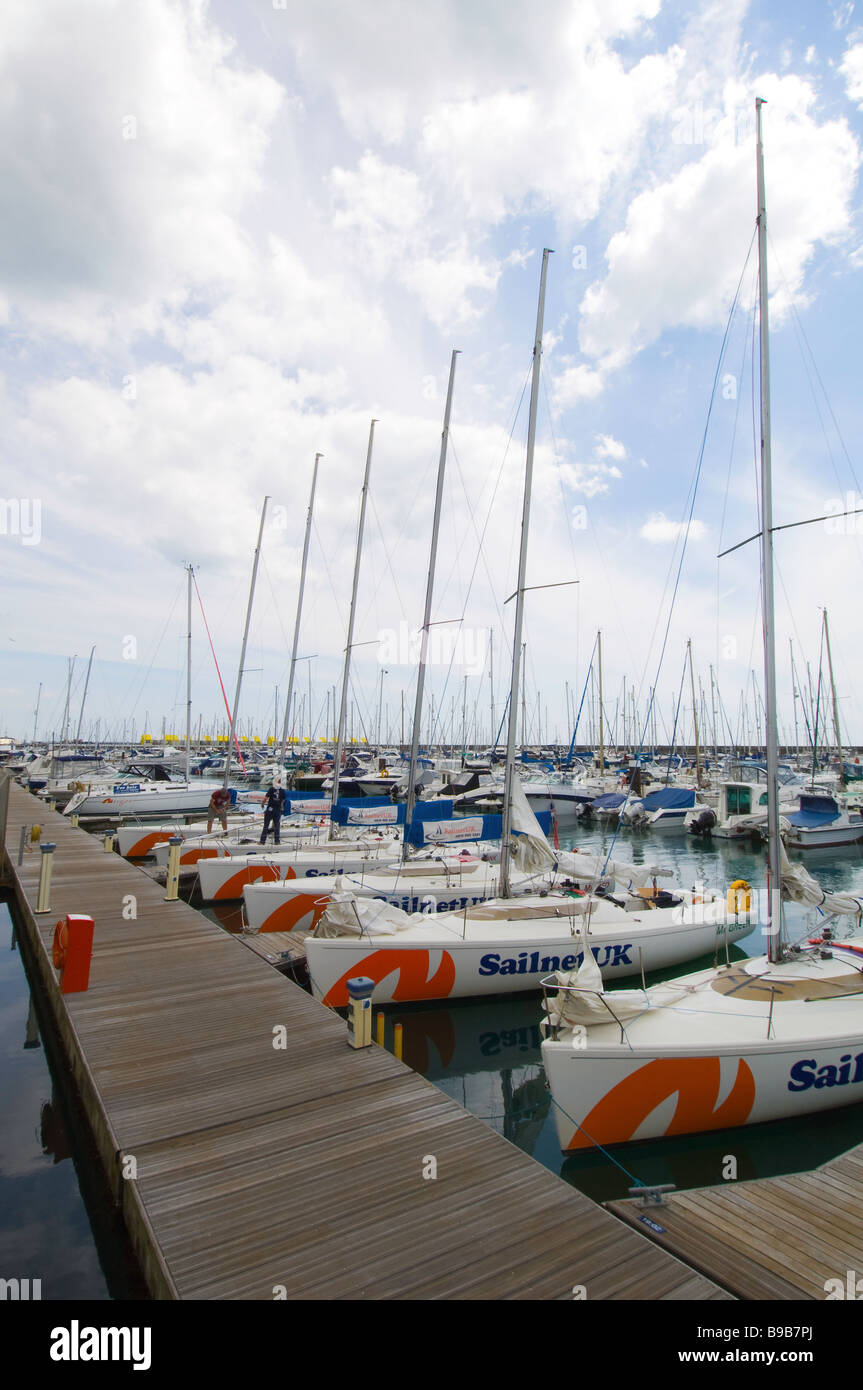 A row of sailing boats at a marina Stock Photo - Alamy