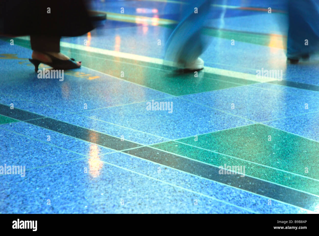Travelers rushing through an airport terminal Stock Photo - Alamy