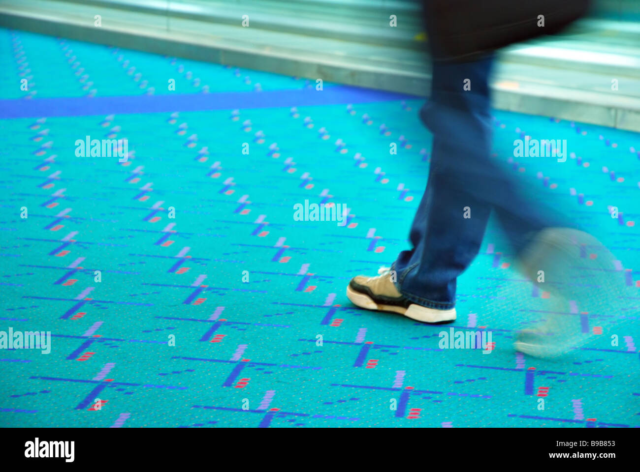 Travelers rushing through an airport terminal Stock Photo - Alamy