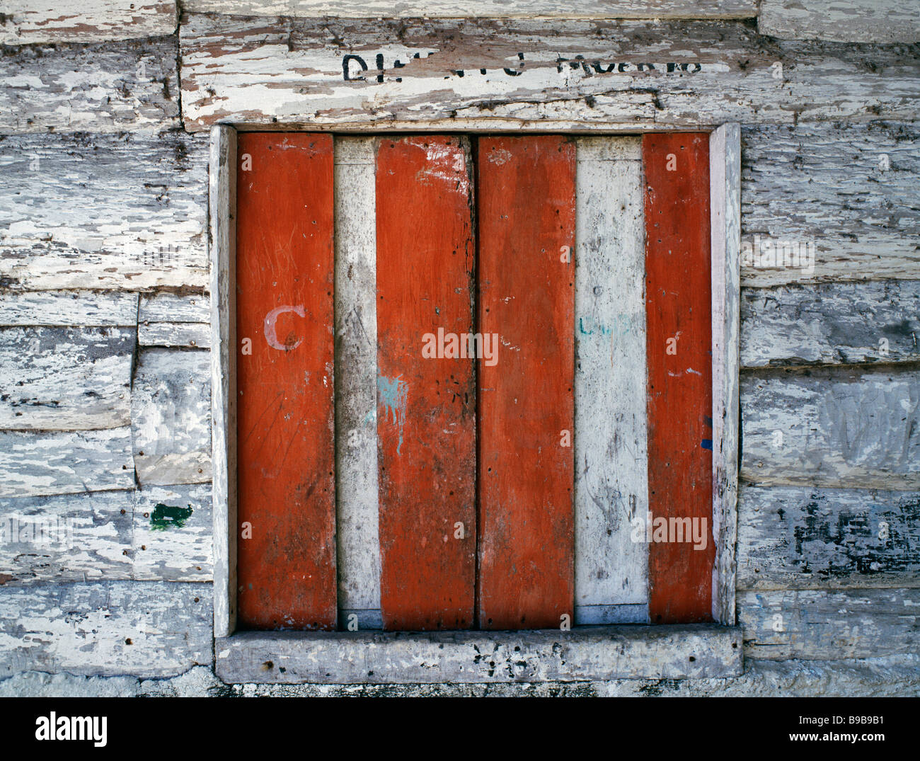 Colorful window shutter on traditional wooden houses Corozal, Belize ...