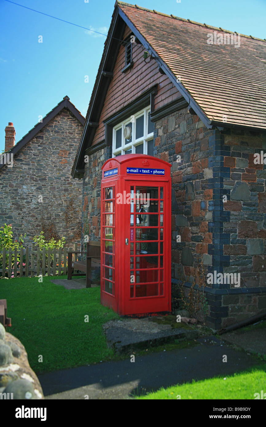 Traditional red telephone box in the village of Allerford, Somerset ...